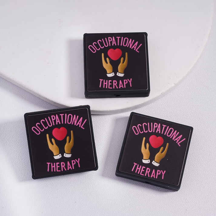 Silicone Focal Beads with Pink Text "OCCUPATIONAL THERAPY" and Hand Li ...