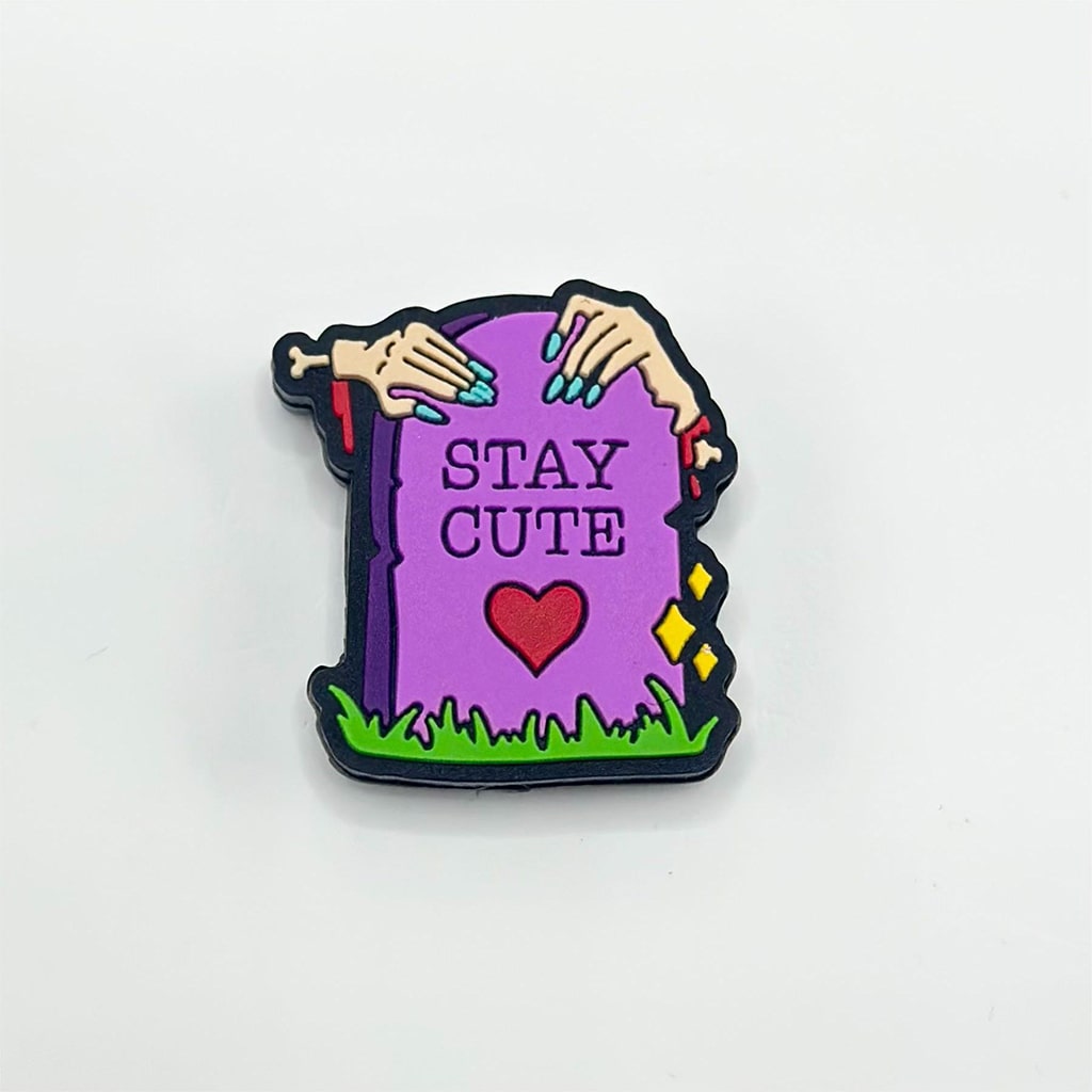Stay Cute Skeleton Hands Hold a Purple Tombstone with a Red Heart Sili ...